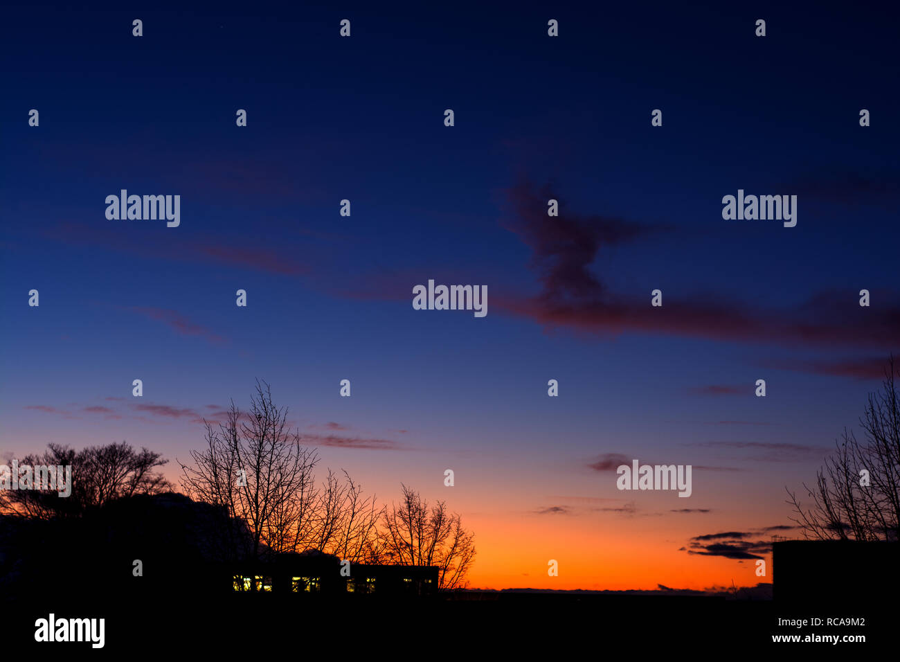 Sunset over roofs hi-res stock photography and images - Alamy