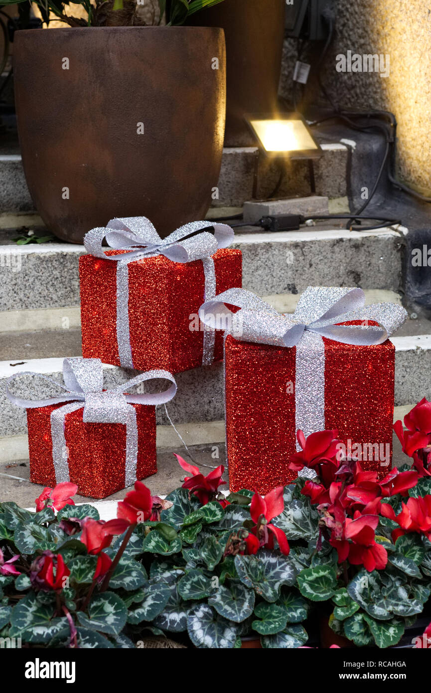 Christmas presents on steps Stock Photo - Alamy