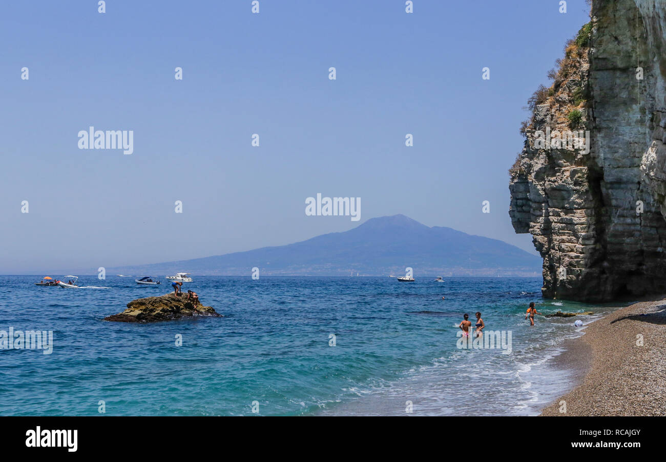 The beach on Amalfi Coast, the volcano Mount Vesuvius in the background ...