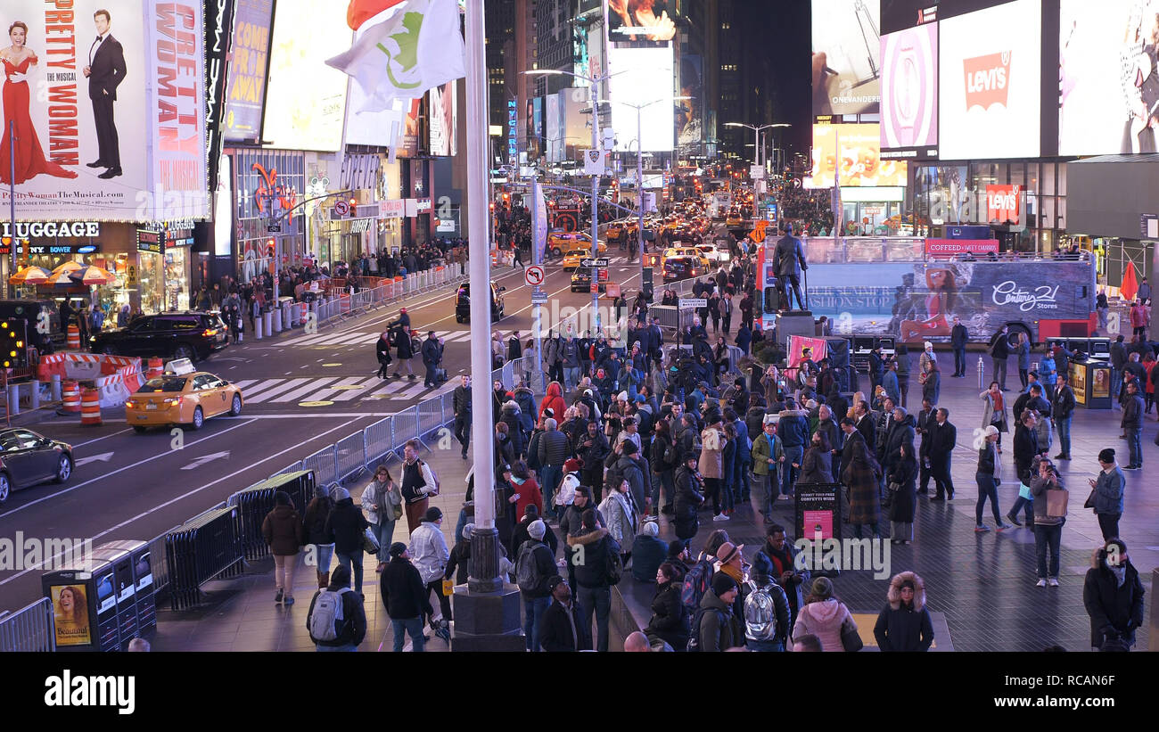 Times Square in Manhattan by night is a busy place - NEW YORK / USA ...