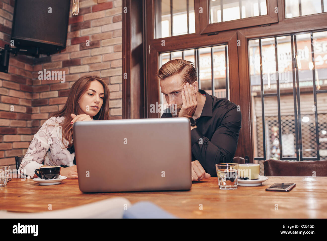 Employees watching the boss hi-res stock photography and images - Alamy