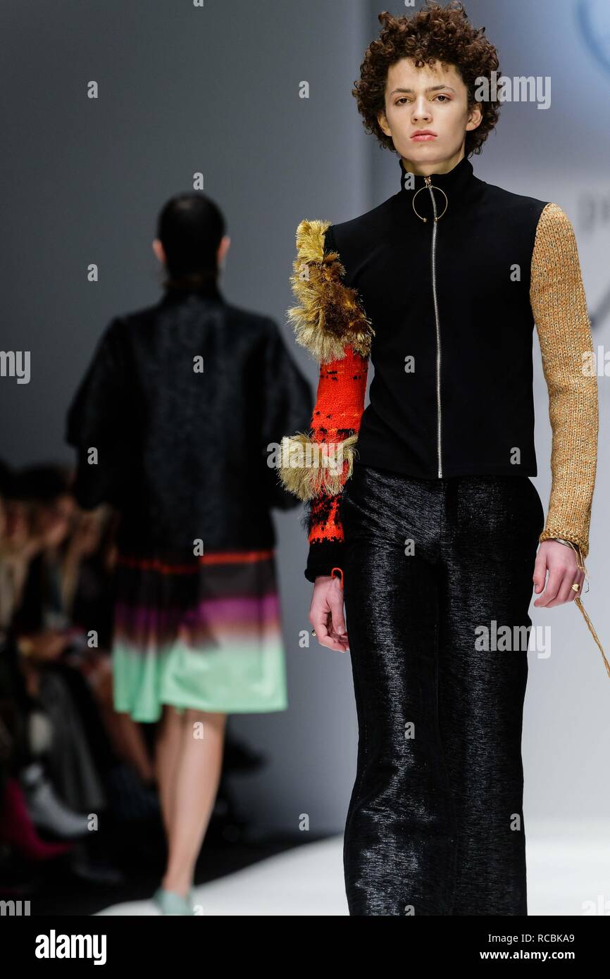 Berlin, Germany. 15th Jan, 2019. A model displays a creation of Sri ...