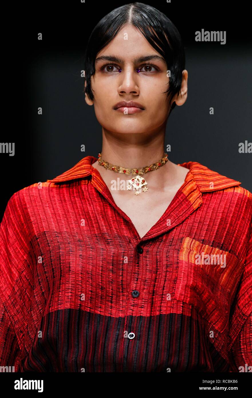 Berlin, Germany. 15th Jan, 2019. A model displays a creation of Sri ...