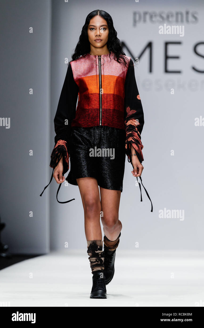 Berlin, Germany. 15th Jan, 2019. A model displays a creation of Sri ...