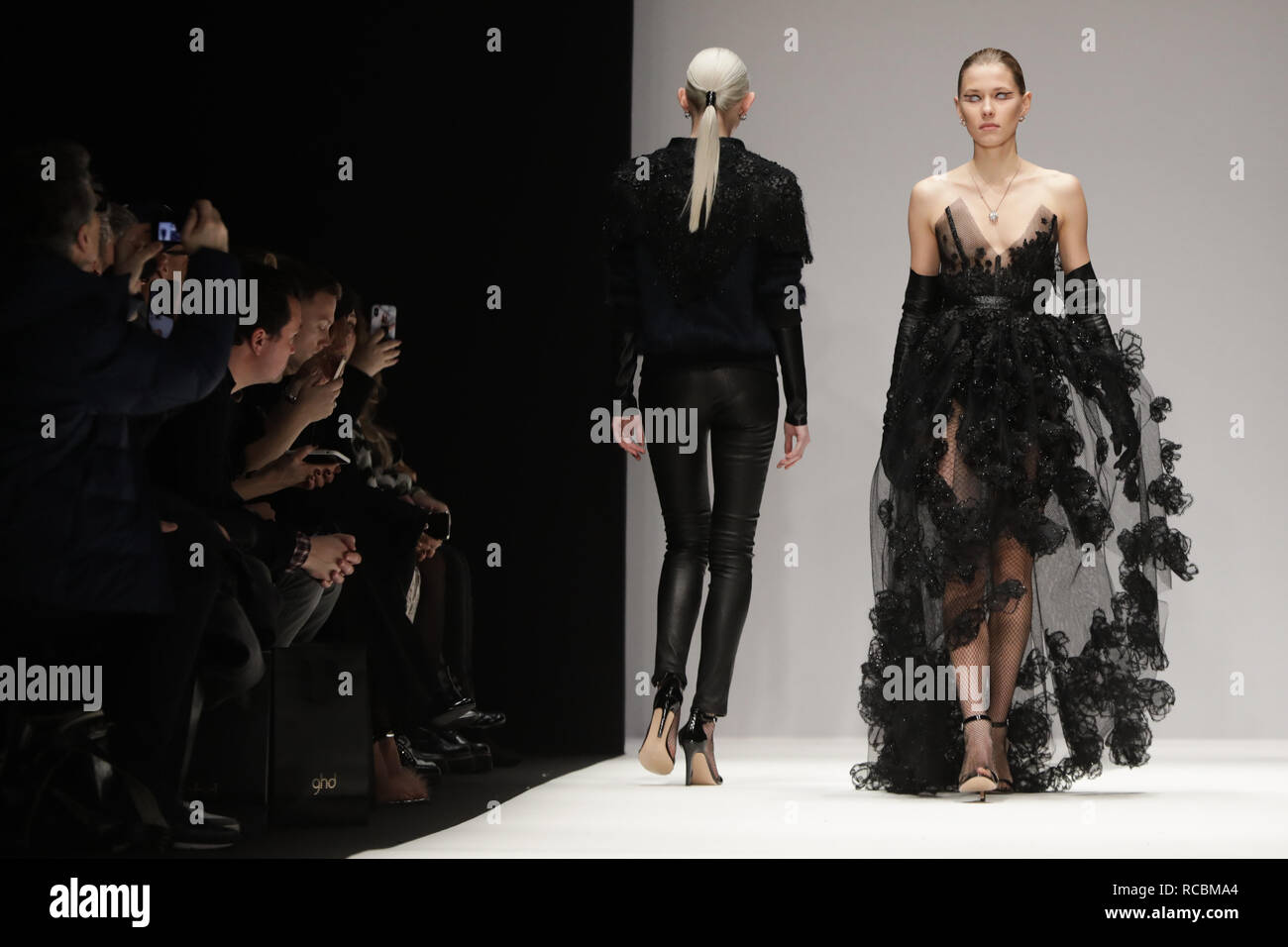 Berlin, Germany. 15th Jan, 2019. Models present fashion by designer ...