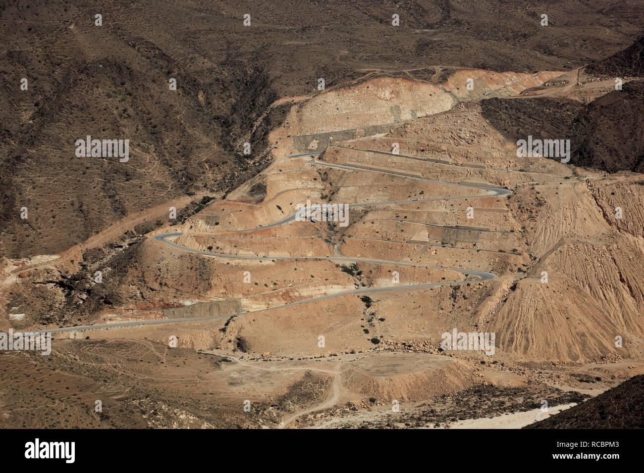 Landscape of the southern Dhofar, Jabal al-Qamar, winding road to Yemen ...
