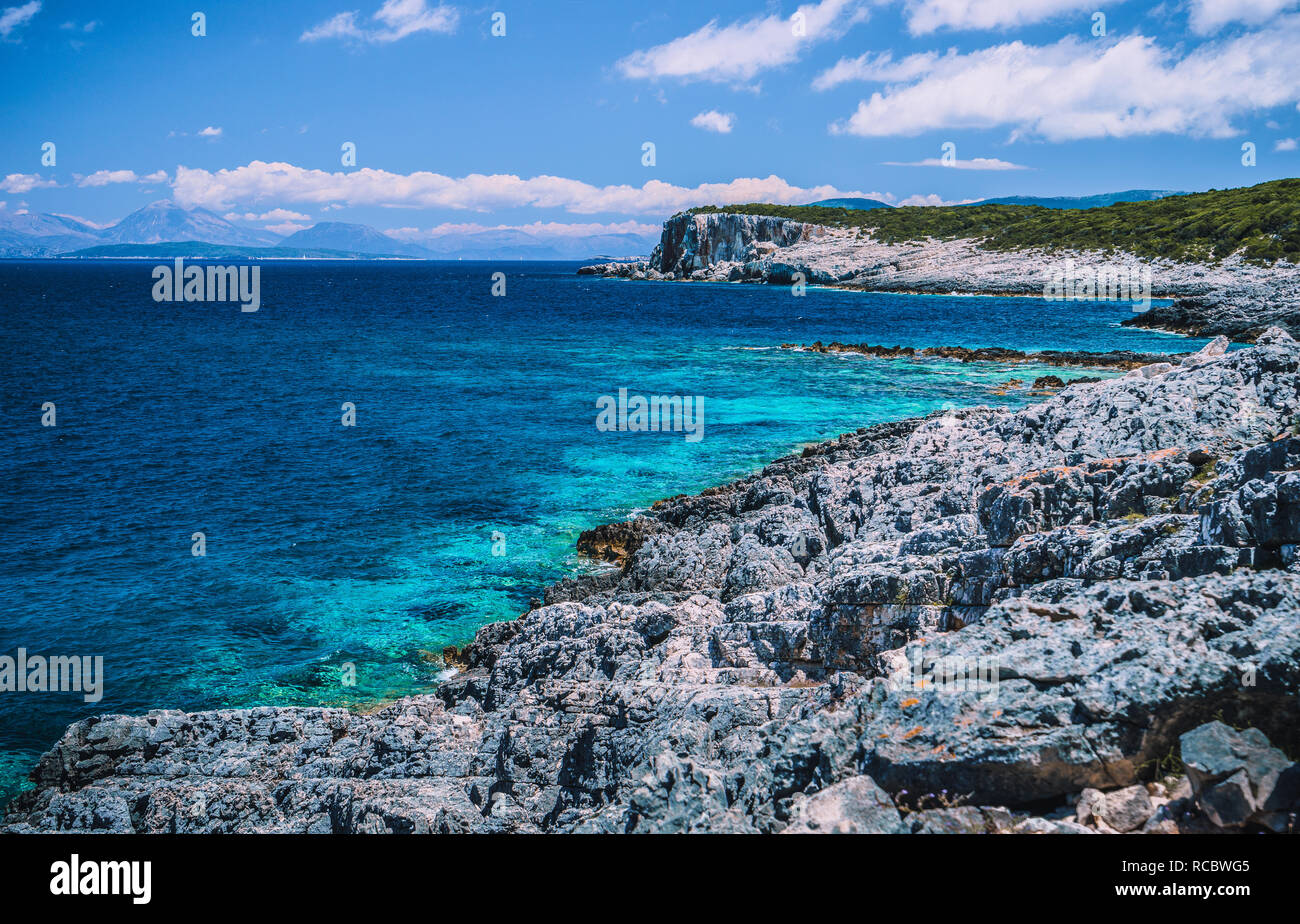 Amazing view of crystal clear blue water and breathtaking cliffs in ...
