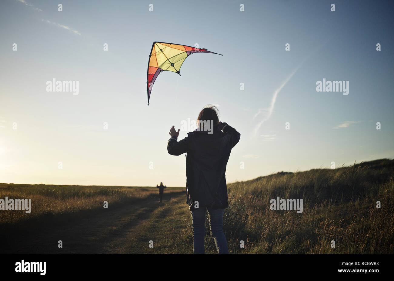 Girl with kite Stock Photo - Alamy