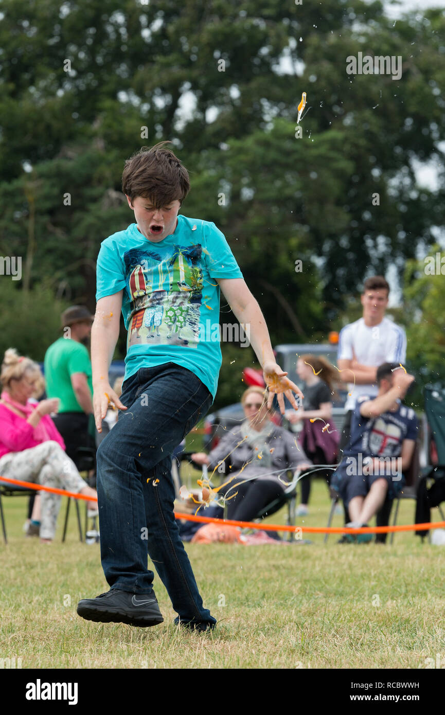 Participant Attempting To Catch A Raw Egg At The World Egg Throwing ...