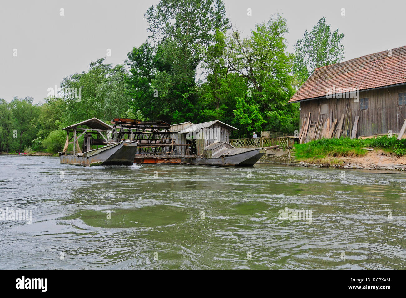 Unique traditional boat mill on a river, Mura river in Slovenia with ...