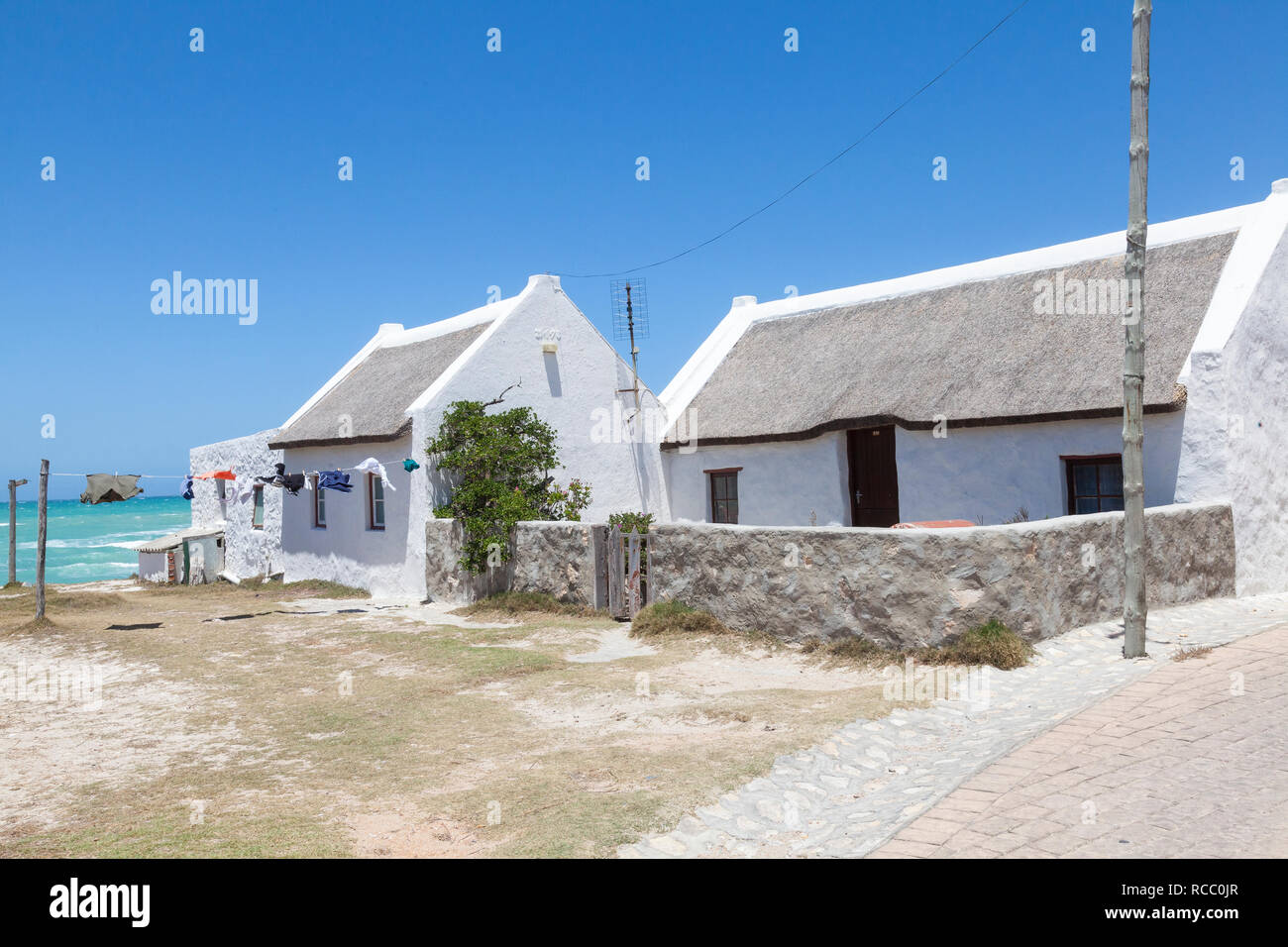 Fisherman's cottages overlooking the sea in the quaint fishing village ...