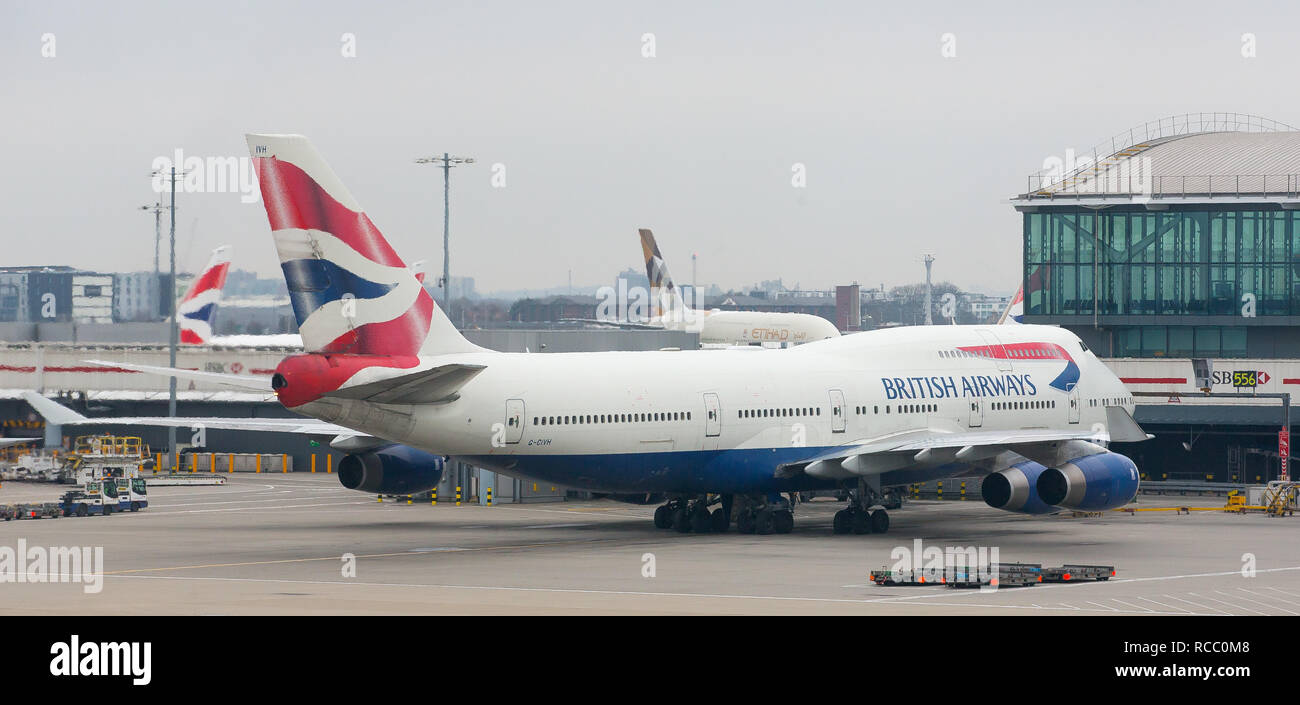 A British Airways Jumbo Jet Boeing 747 on stand at Heathrow Terminal 5 ...