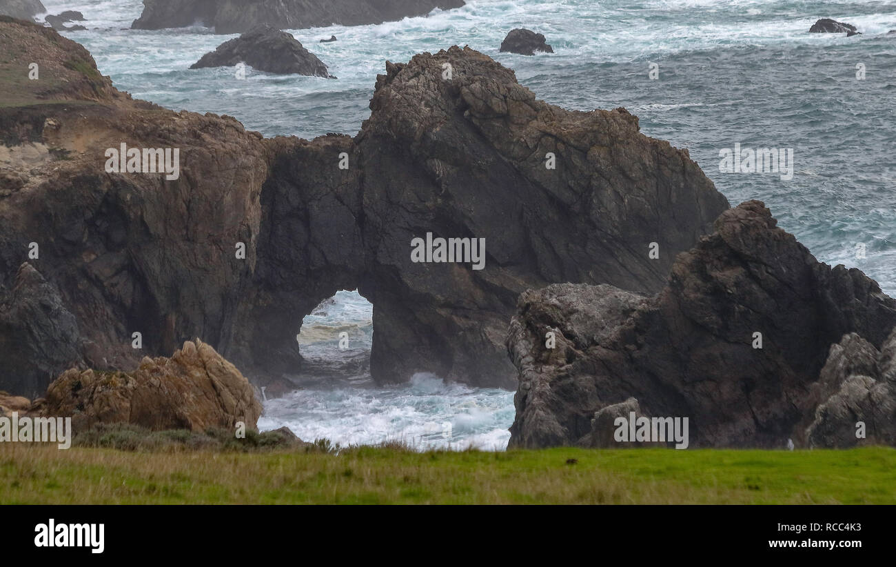 Beautiful keyhole rocks formations on the Pacific Ocean near Big Sur ...