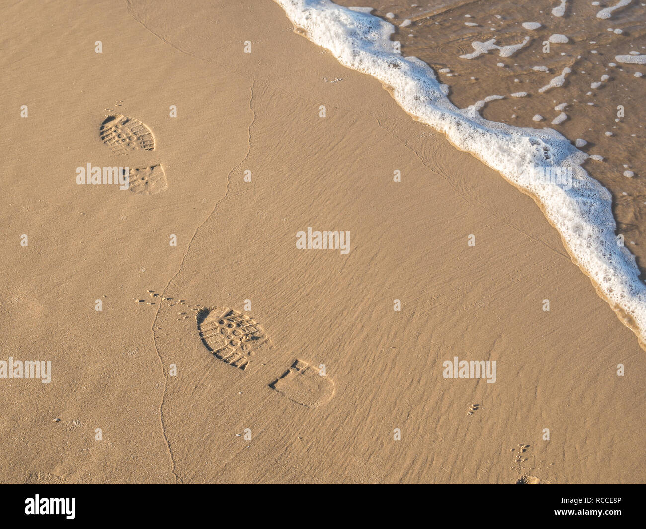 Shoe marks on the beach Stock Photo - Alamy