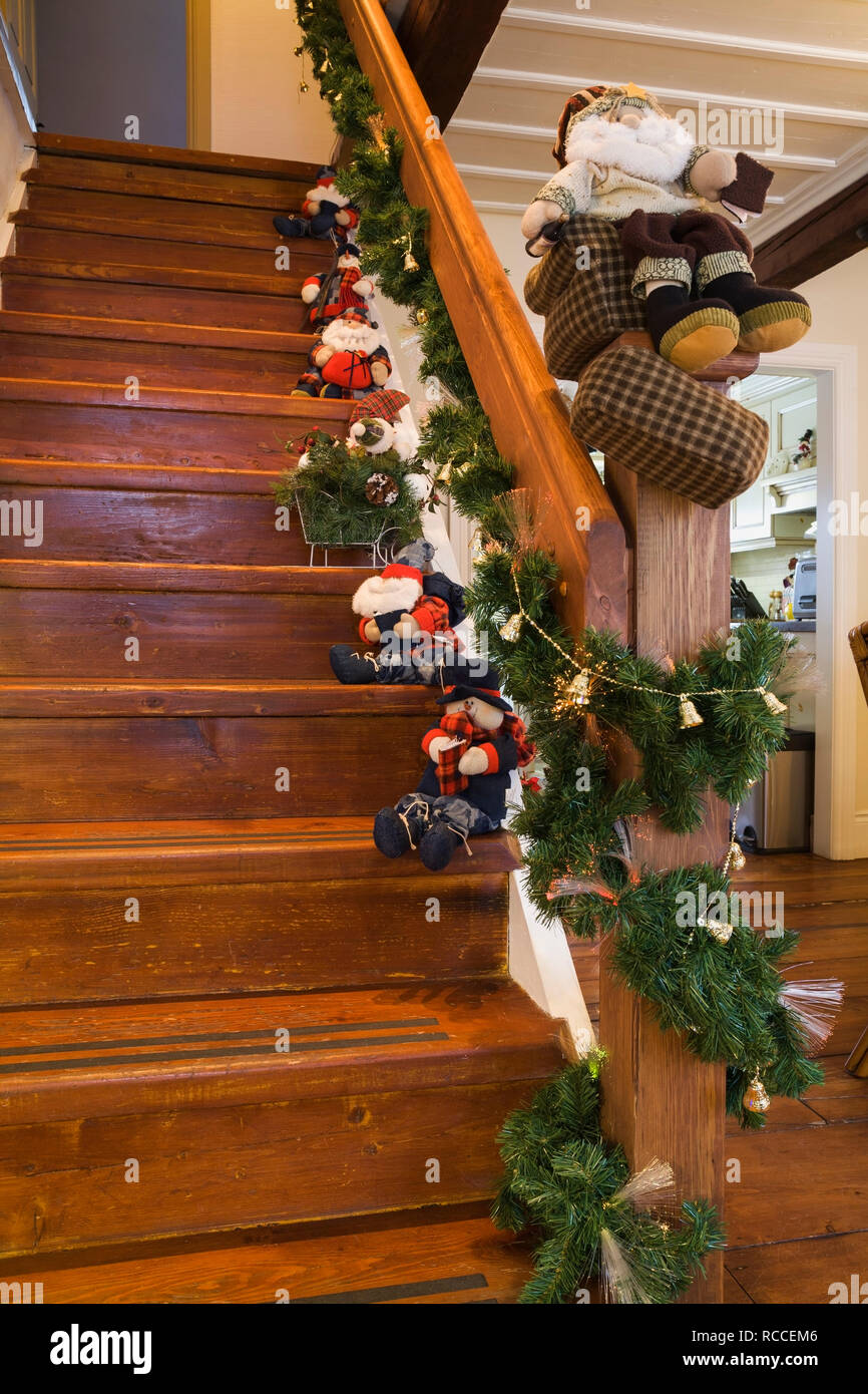 Old wooden staircase with Christmas decorations inside an old circa ...