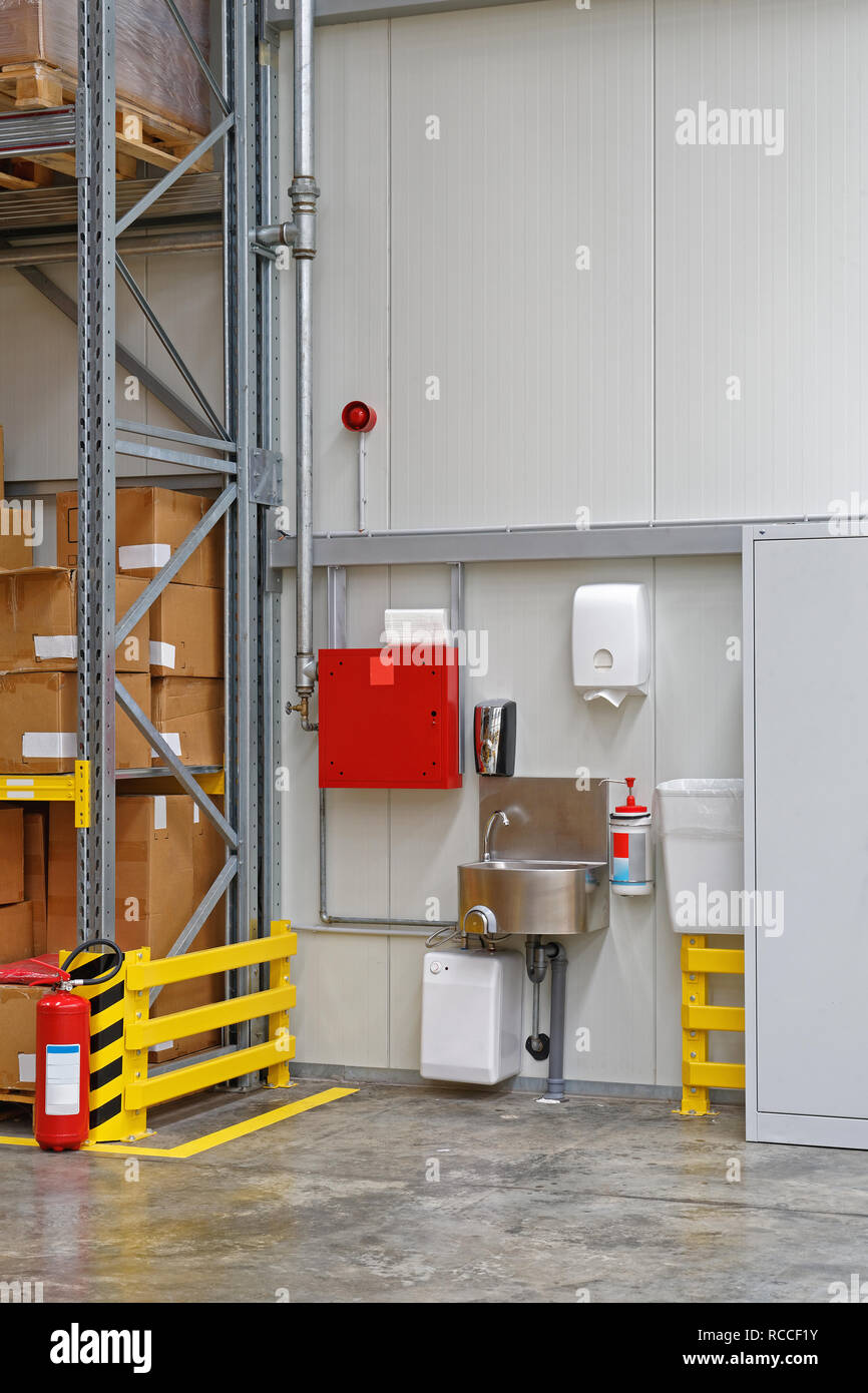 Washing Station Safety Hydrant in Warehouse Factory Stock Photo - Alamy