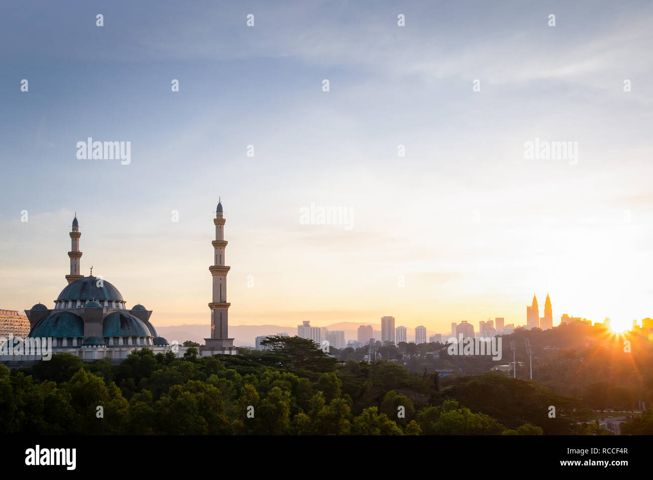 Federal Mosque view during the sunrise with Kuala Lumpur Cityscape ...