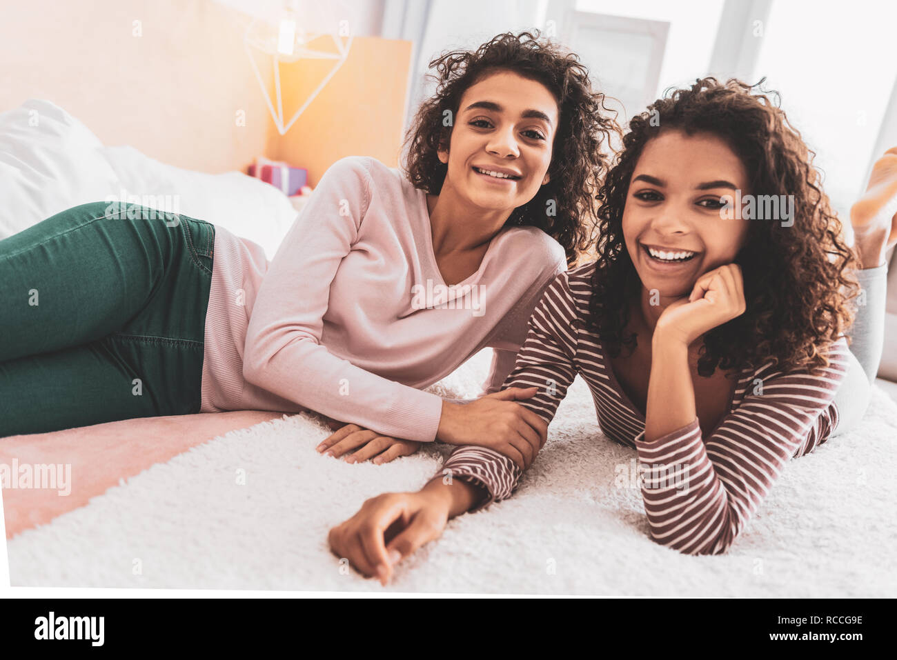 Gorgeous young women smiling while having memorable time Stock Photo ...