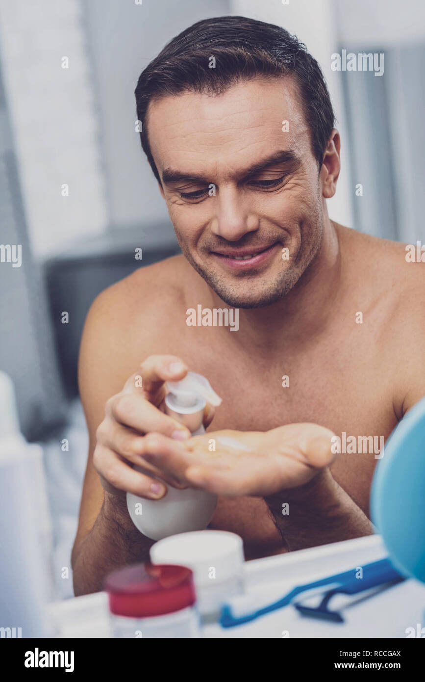 Man washing face with soap hi-res stock photography and images - Alamy