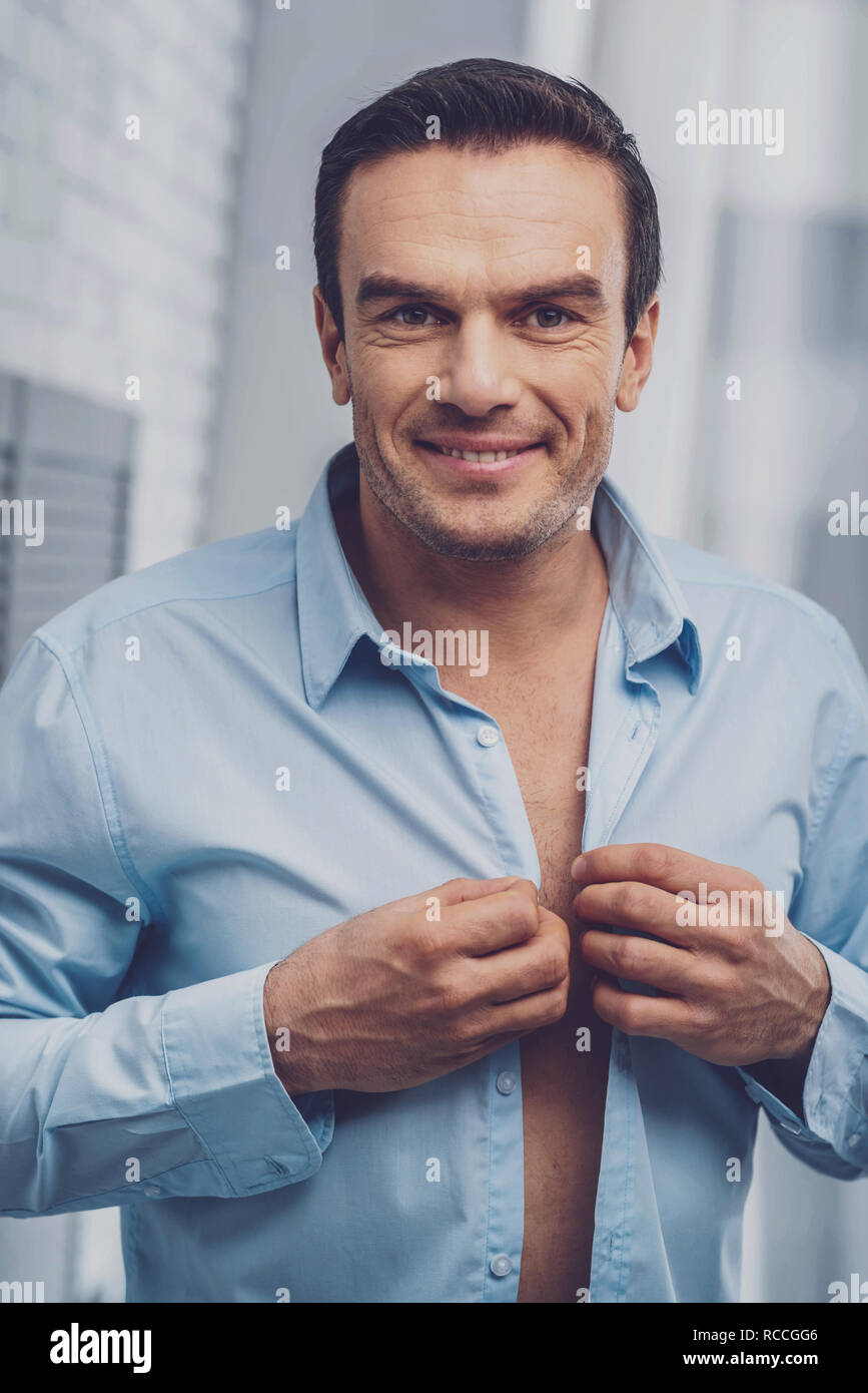 Positive nice man looking at you Stock Photo - Alamy