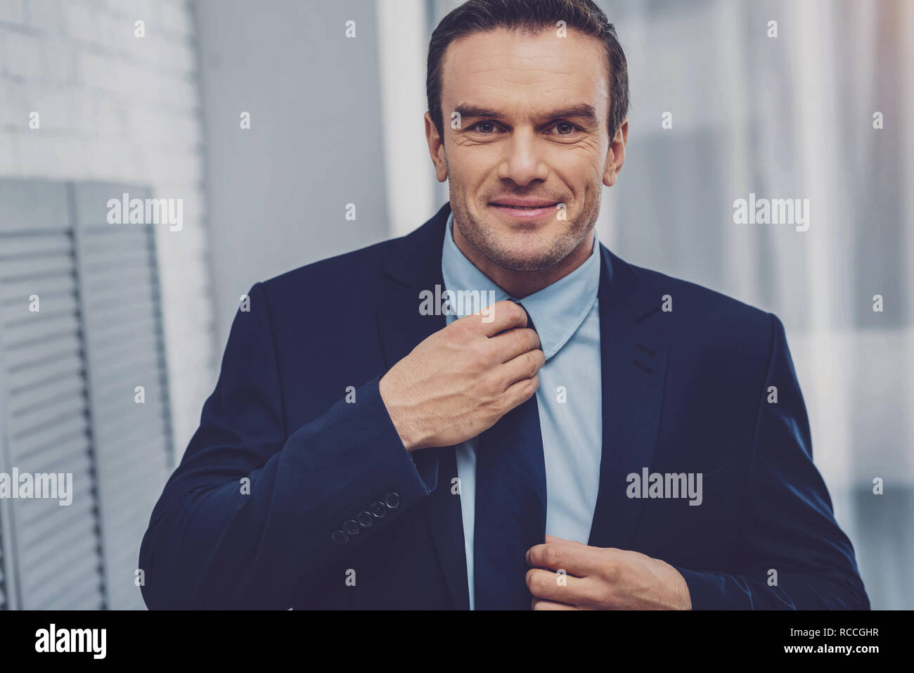 Confident nice man being ready Stock Photo - Alamy