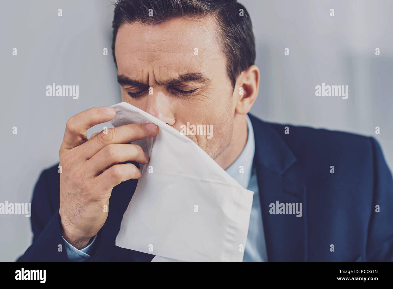 Office worker sneezing hi-res stock photography and images - Alamy
