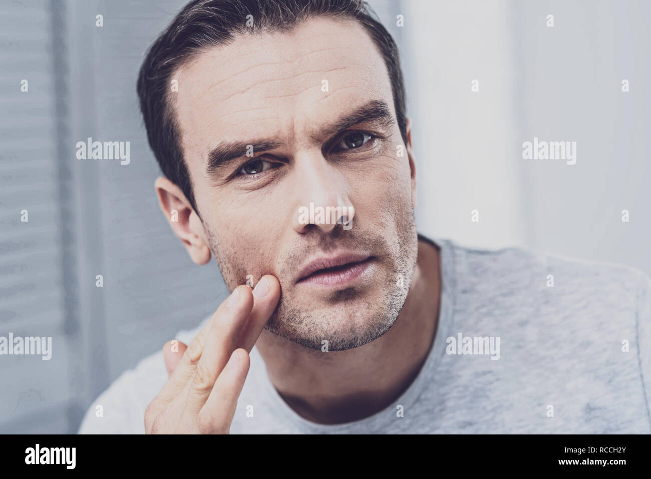 Confident young man creating plan Stock Photo - Alamy