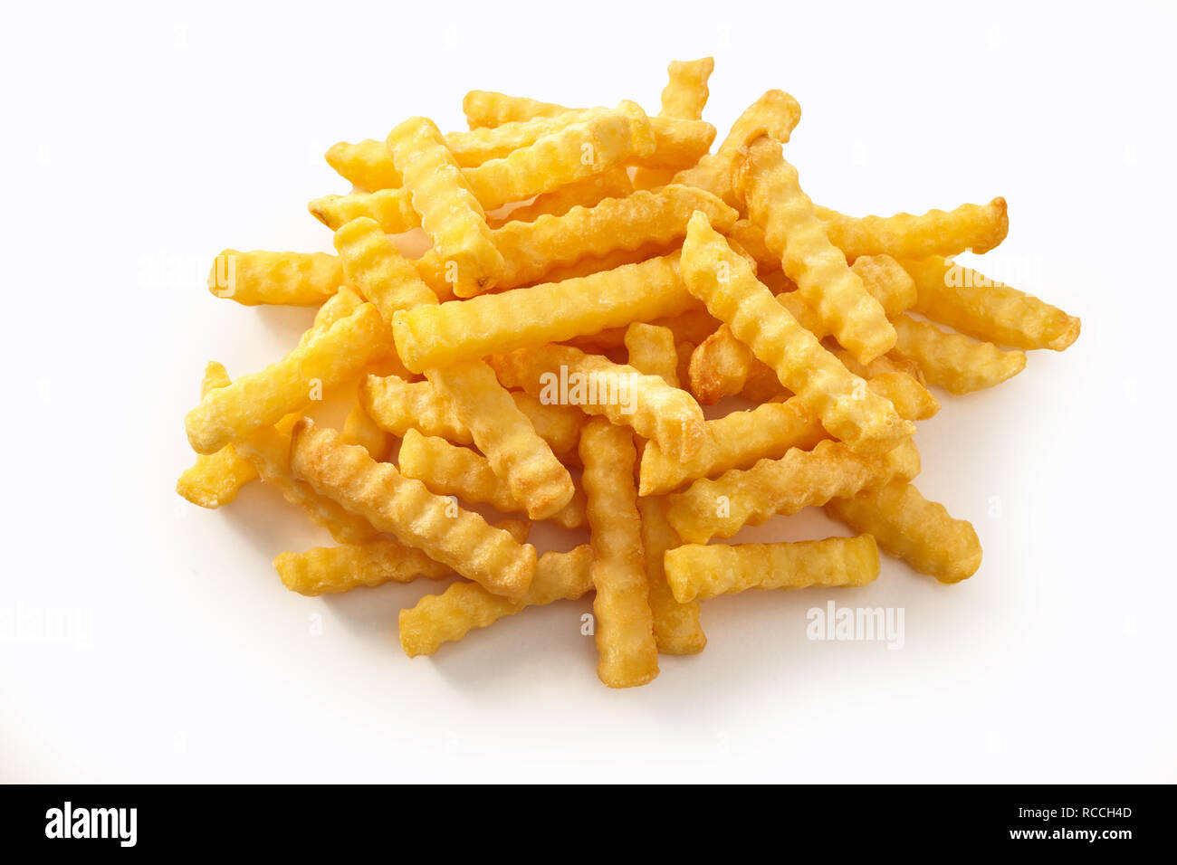 Delicious golden crispy crinkly potato chips, pommes frites or french ...