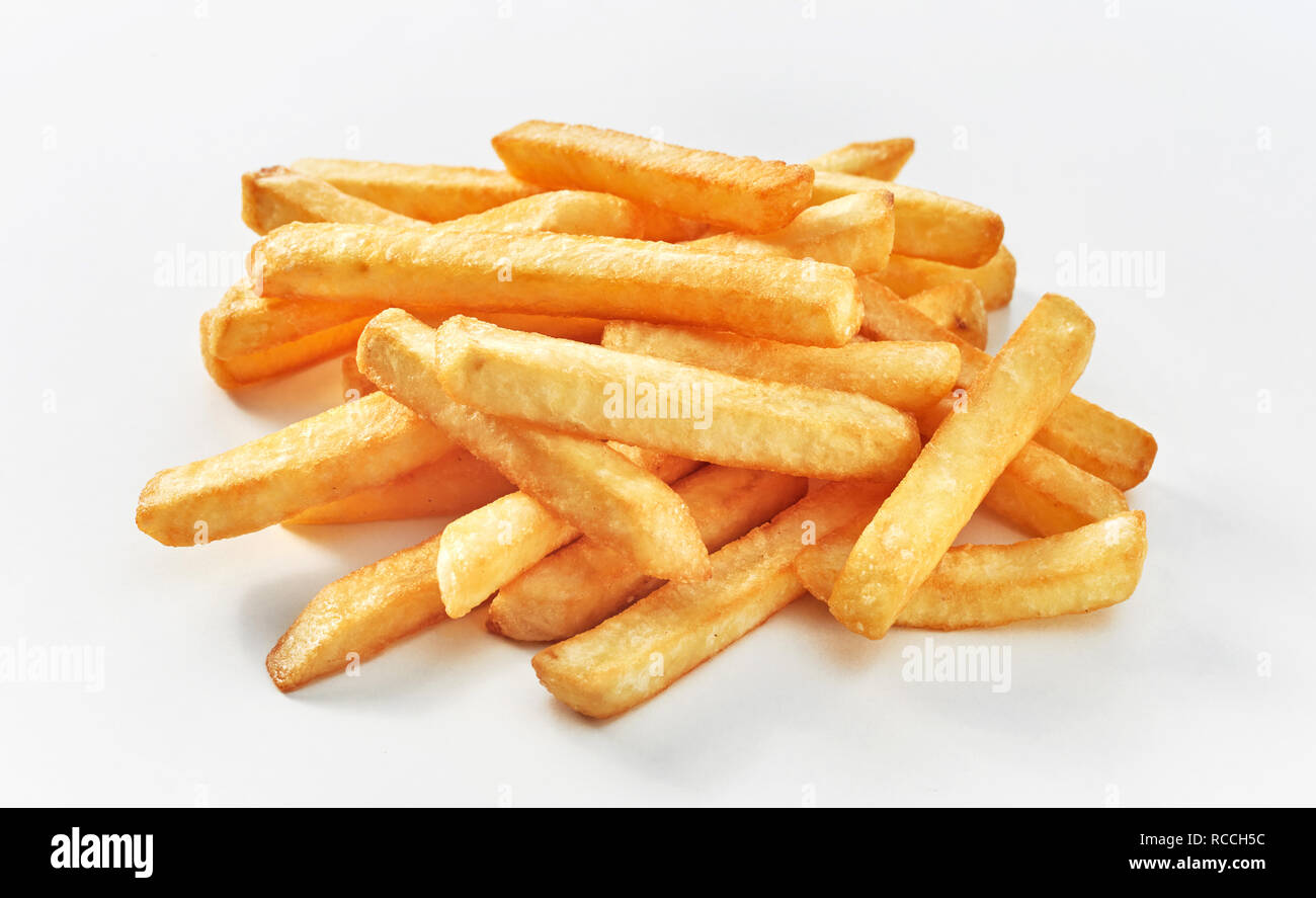 Stack of middle cut french fries on white background Stock Photo - Alamy
