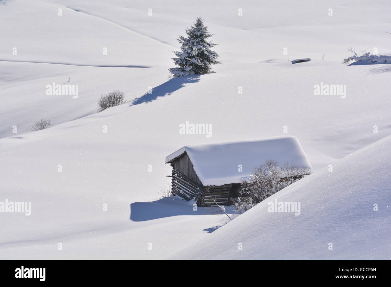 Wood cabin in deep snow. Winter in the Austrian Alps Stock Photo - Alamy