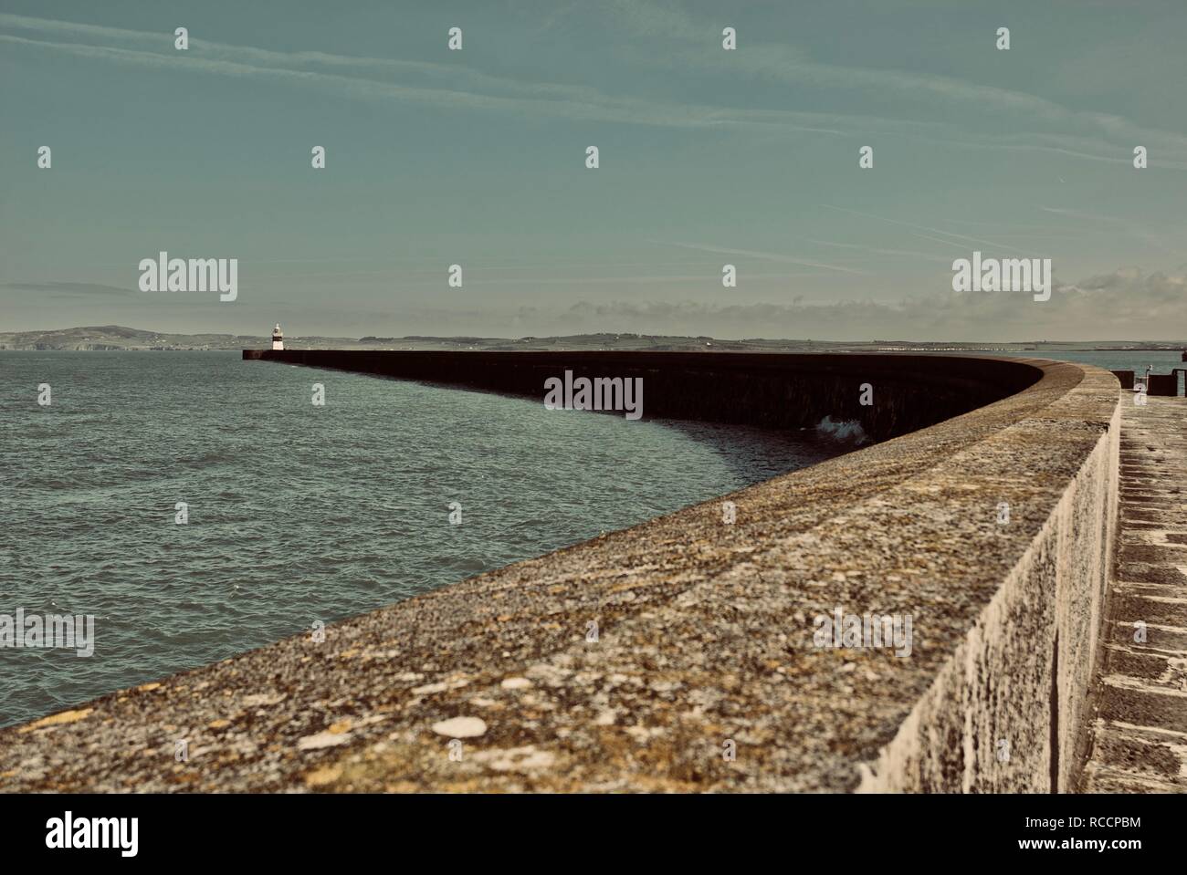 The Holyhead Breakwater with the Breakwater Lighthouse in the distance ...
