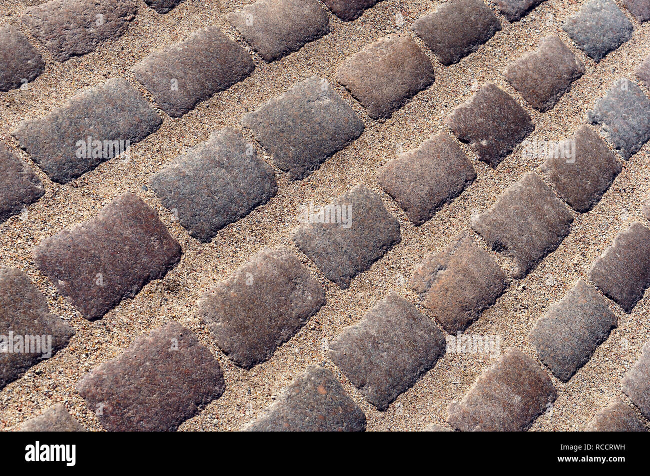 a smooth paving stone, road paving stones, cobblestones Stock Photo - Alamy
