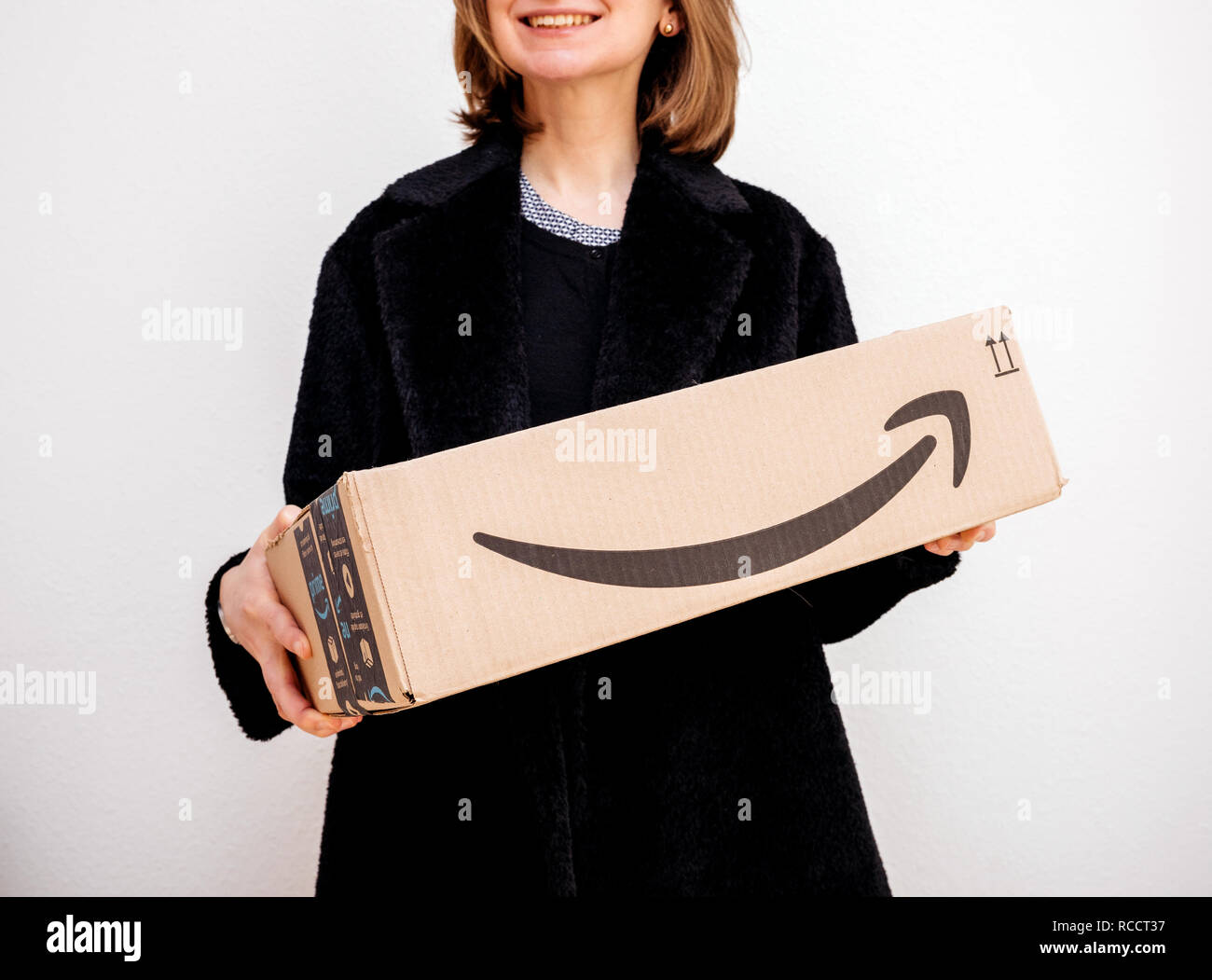 Holding amazon order carton hi-res stock photography and images - Alamy