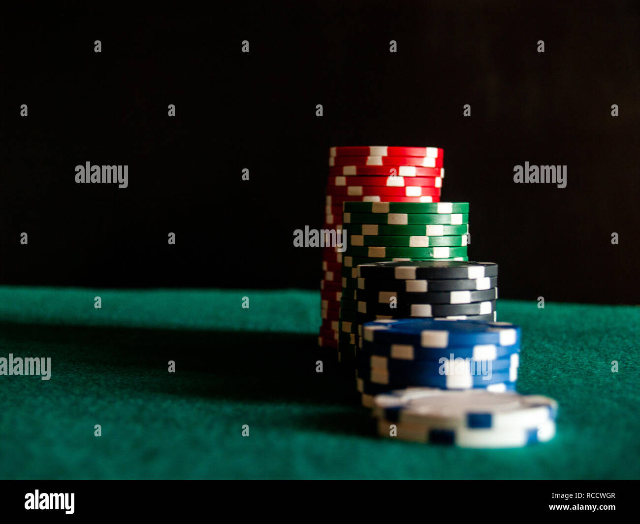 Piles of poker chips hi-res stock photography and images - Alamy