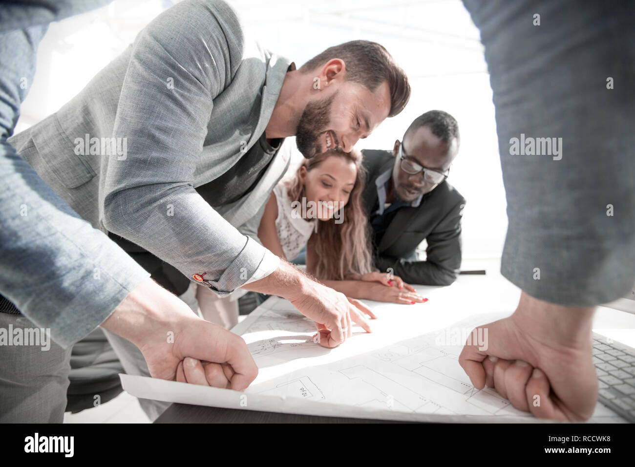 close up.architect and design team discussing new ideas Stock Photo - Alamy