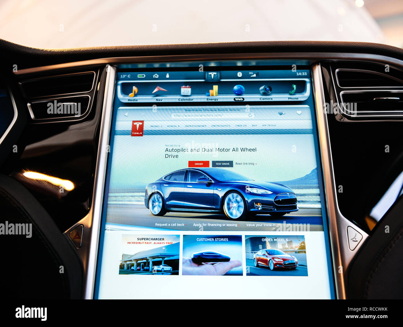 PARIS, FRANCE - NOV 29, 2014: POV at the new Tesla Model S dashboard ...
