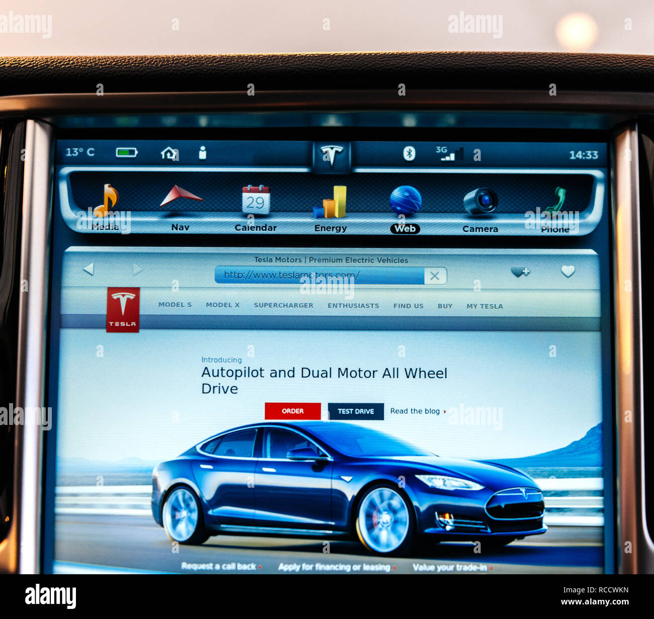 PARIS, FRANCE - NOV 29, 2014: Tesla Model S dashboard computer display ...