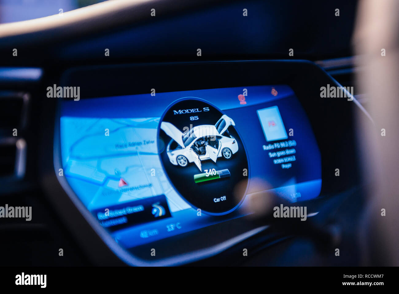PARIS, FRANCE - NOV 29, 2014: POV New Tesla Model S dashboard computer ...