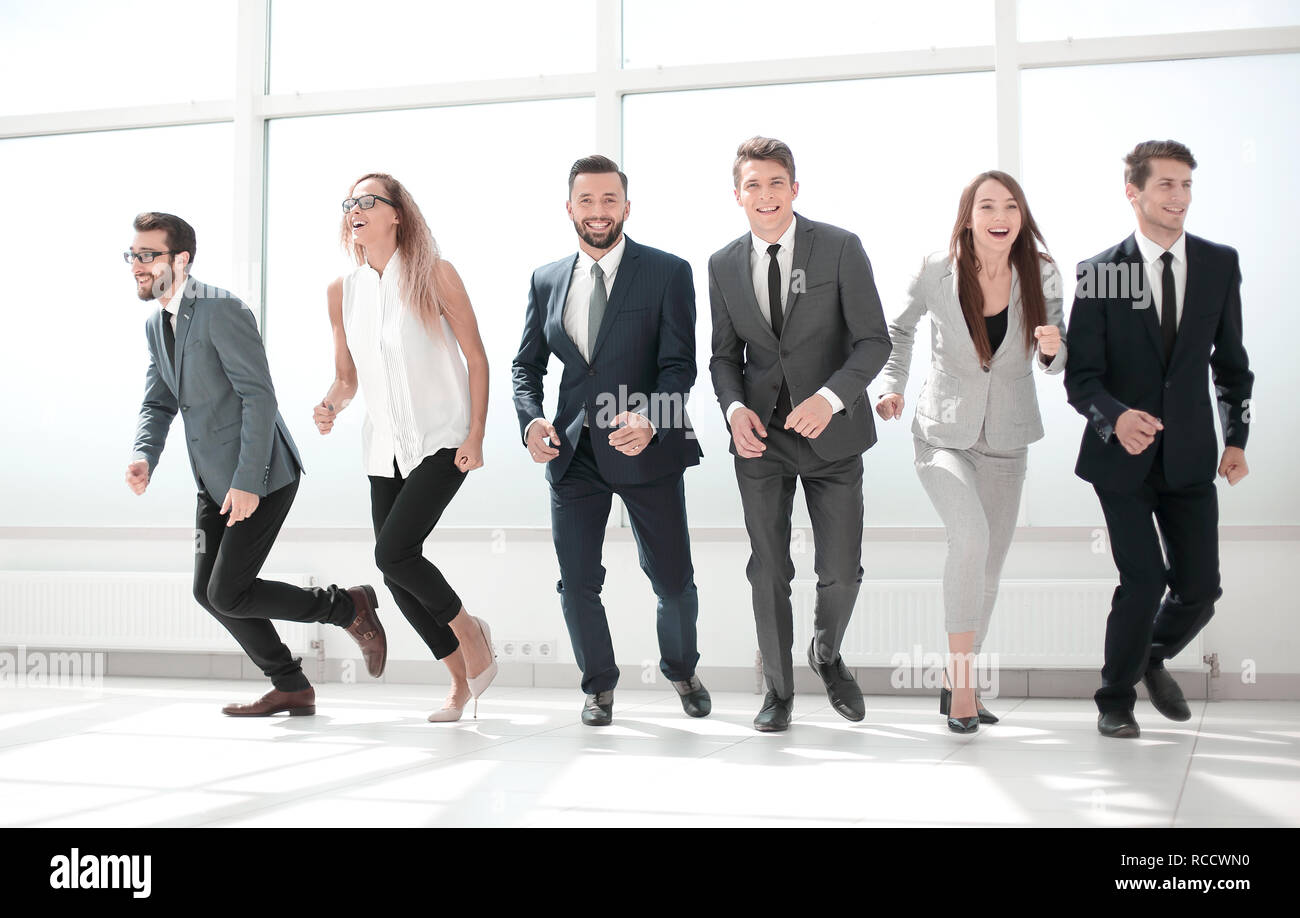 business team running together Stock Photo - Alamy