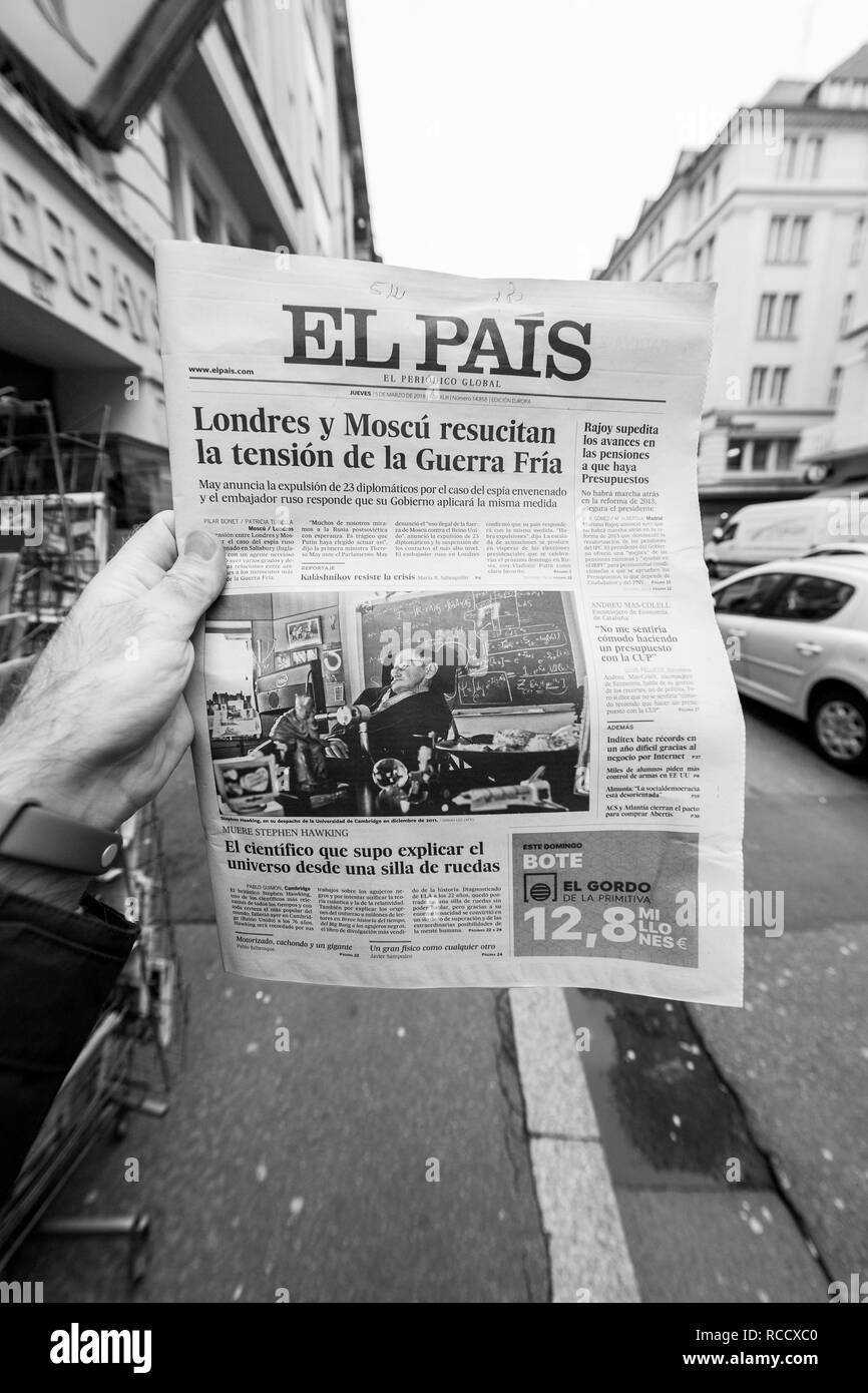 PARIS, FRANCE - MAR 15, 2018: Male hand holding Spanish El Pais ...