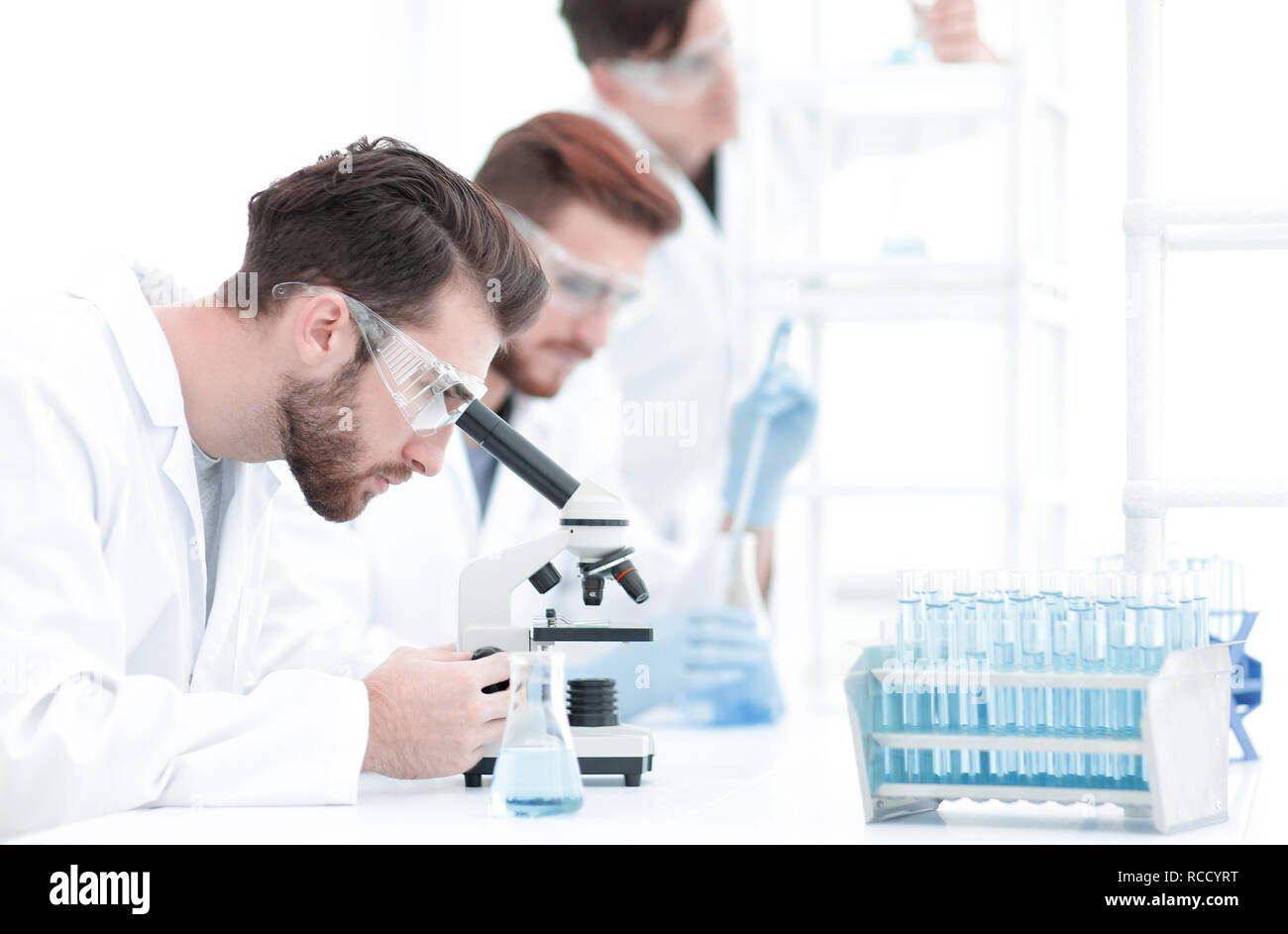 background image scientists working with the microscope Stock Photo - Alamy
