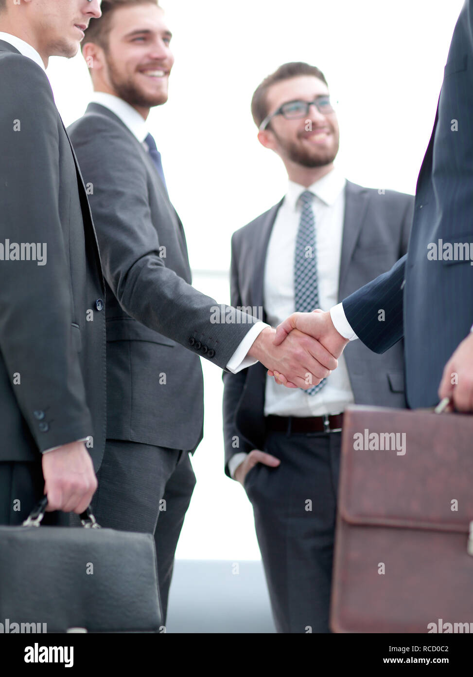 business partners shaking hands Stock Photo - Alamy