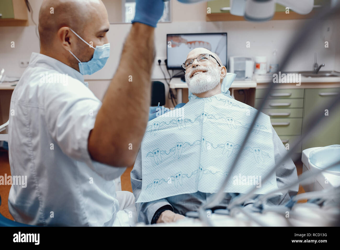 White male patient at the dentists office hi-res stock photography and ...