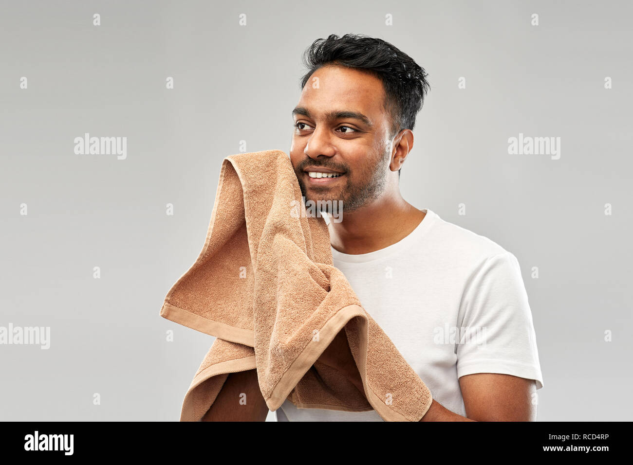 Man drying face towel hi-res stock photography and images - Alamy