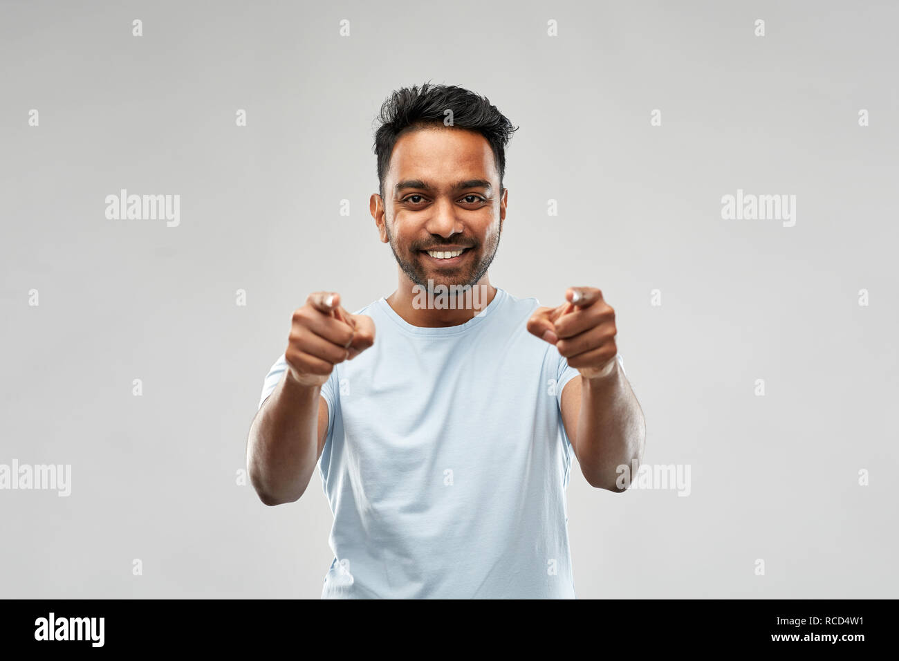 smiling indian man pointing fingers at you Stock Photo - Alamy