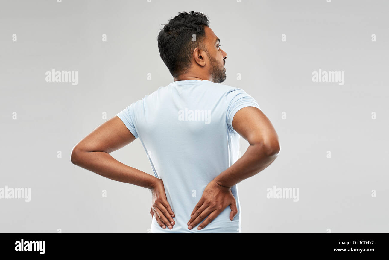 Indian man backache pain illness hi-res stock photography and images ...