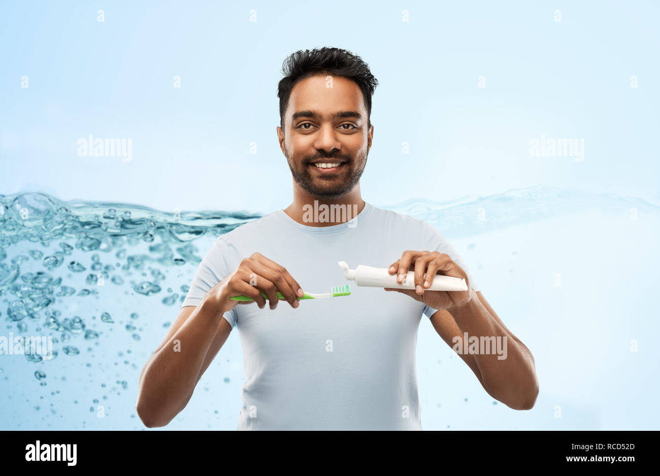indian man with toothbrush and toothpaste Stock Photo - Alamy