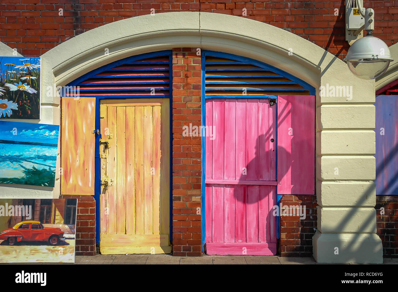 Brighton seafront archway Quirky colourful doors Stock Photo - Alamy