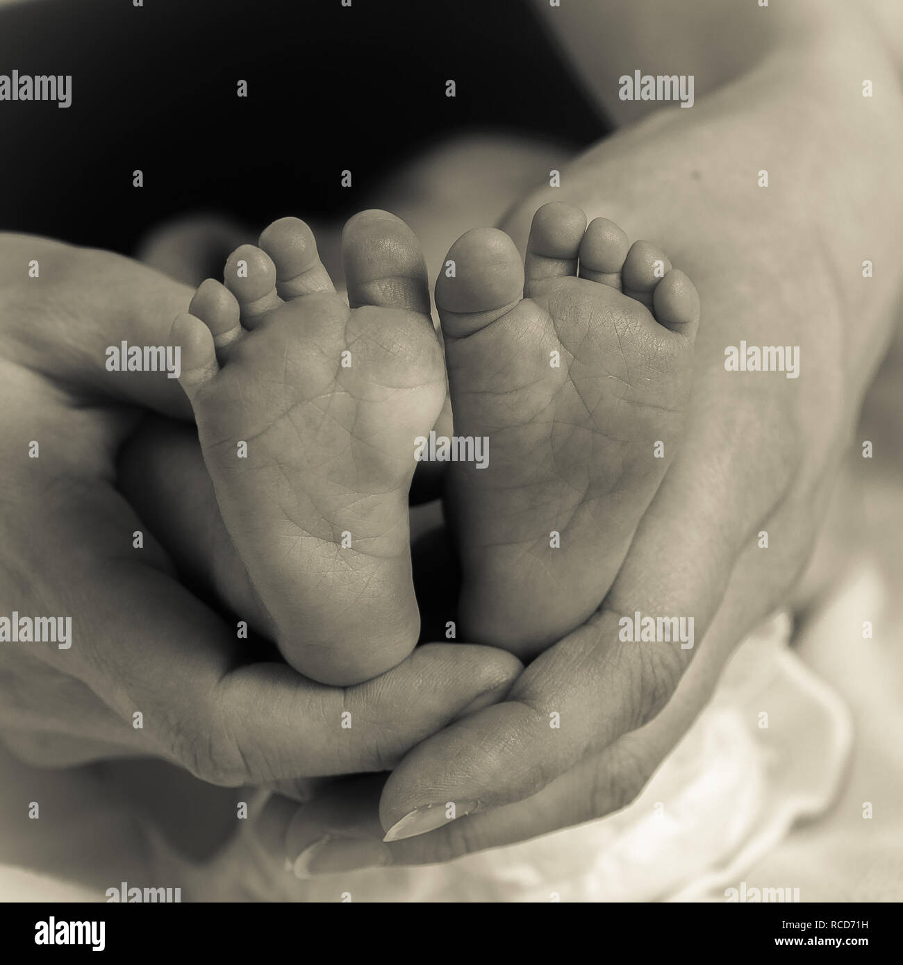 Baby feet black and white hi-res stock photography and images - Alamy