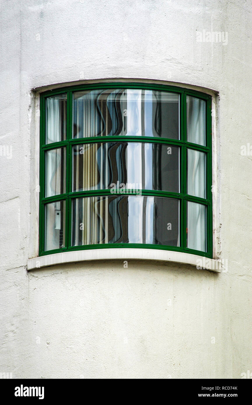 Curved glass in curved window in a Art Deco building Stock Photo - Alamy